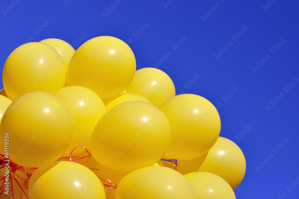 yellow balloons on blue sky background Stock Photo | Adobe Stock