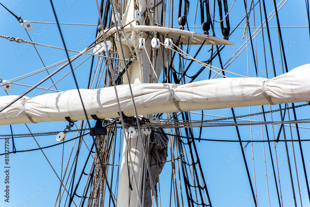 sailboat masts, rigging and rolled up sails Stock Photo | Adobe Stock
