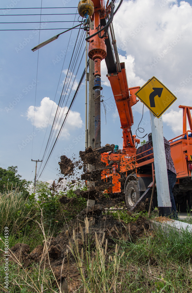 Drilling holes in ground Stock Photo | Adobe Stock