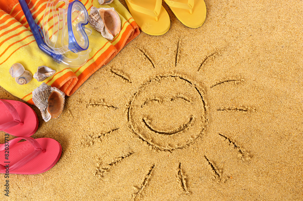 Smiling sun happy smiley face drawing drawn in sand with child hands on ...
