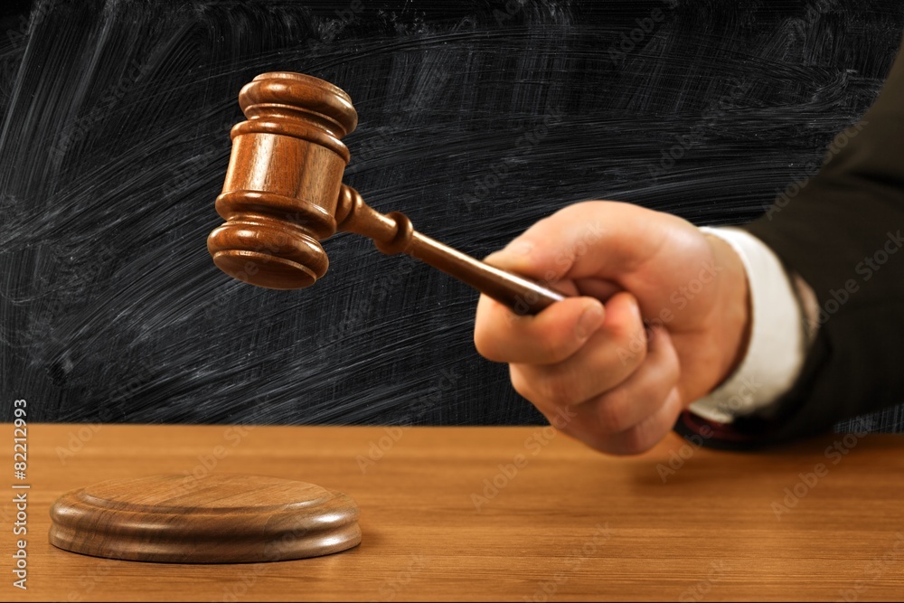 Gavel. Judge's hold hammer on wooden table Stock Photo | Adobe Stock