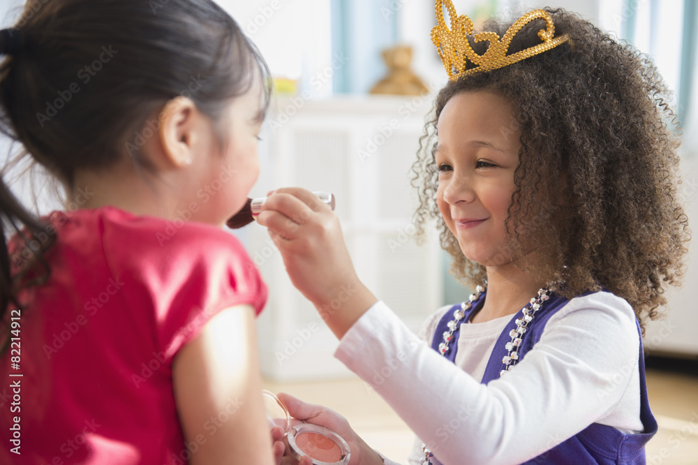 Girls playing dress up together Stock Photo | Adobe Stock