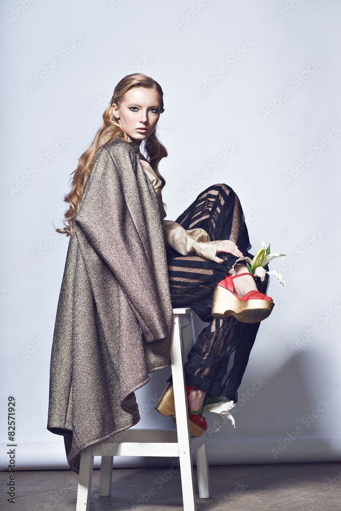 Fashion model pose on light background Stock Photo | Adobe Stock