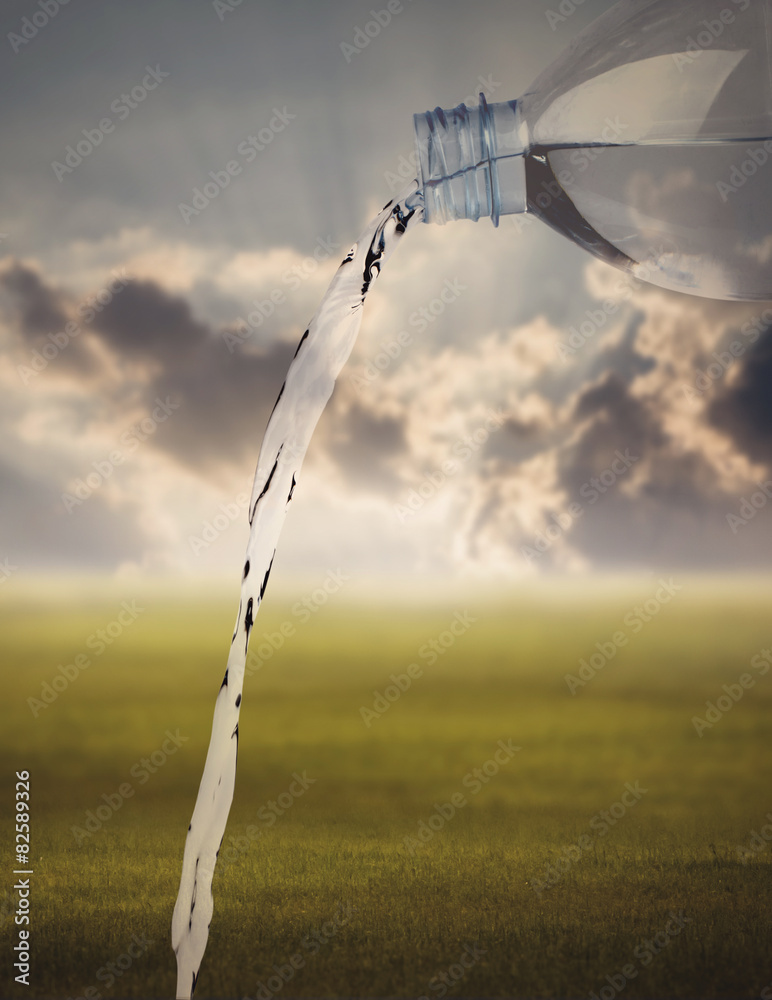 Pouring water Pouring water against the nature background in vin Stock ...