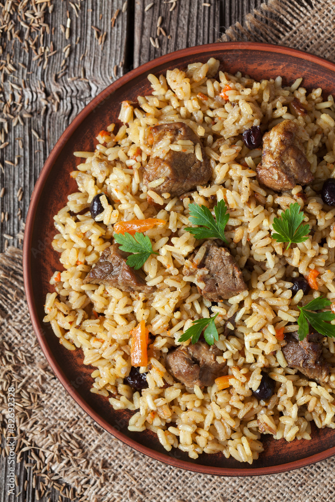 Arabic cuisine national rice food called pilaf with fried lamb Stock ...