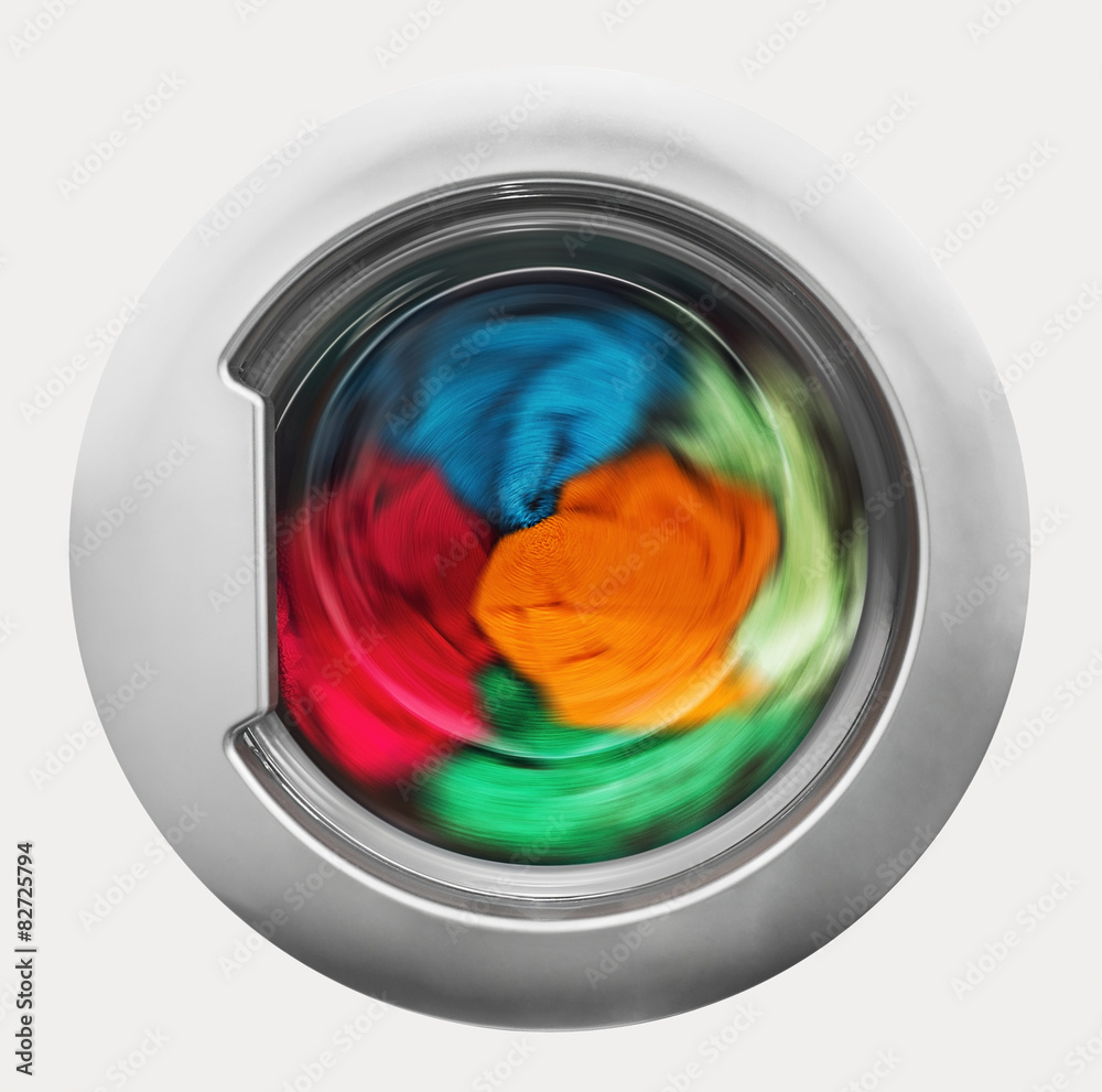 Washing machine door with rotating garments inside Stock Photo | Adobe ...