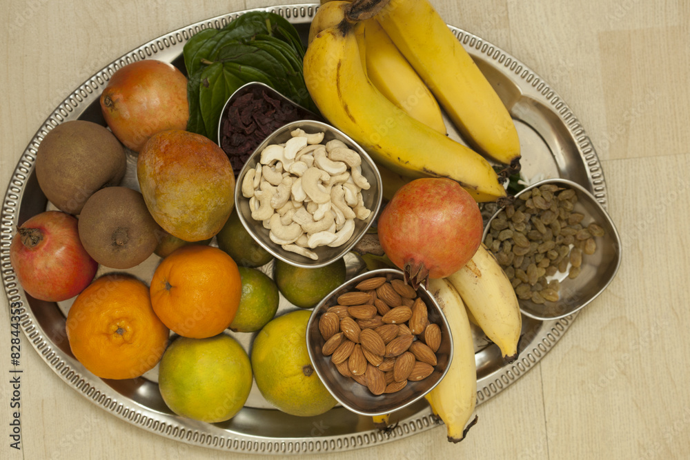 Fruits and dry fruits from thread ceremony function, India Stock Photo ...