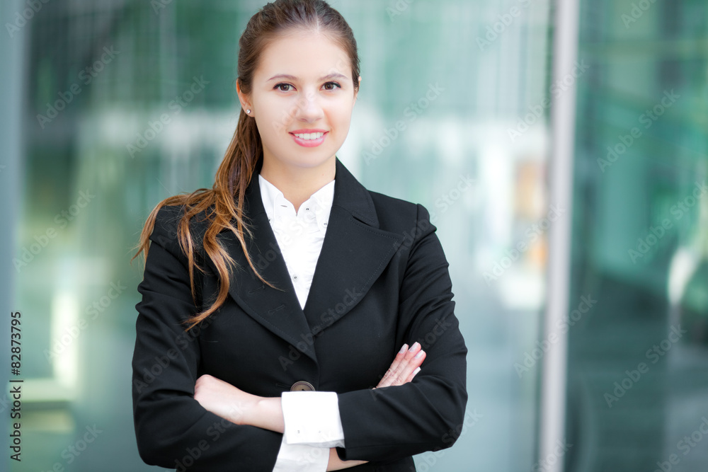 Smiling young female manager Stock Photo | Adobe Stock