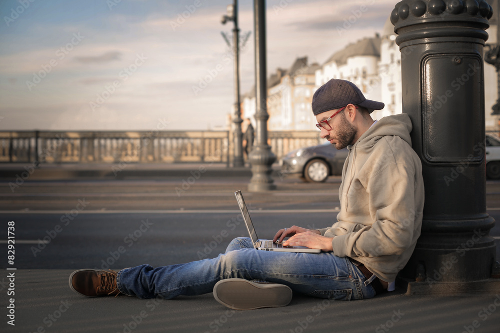 Sitting on the ground Stock Photo | Adobe Stock