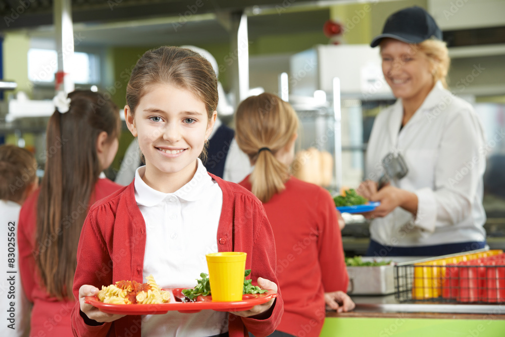 Female Pupil With Healthy Lunch In School Cafeteria Stock Photo | Adobe ...