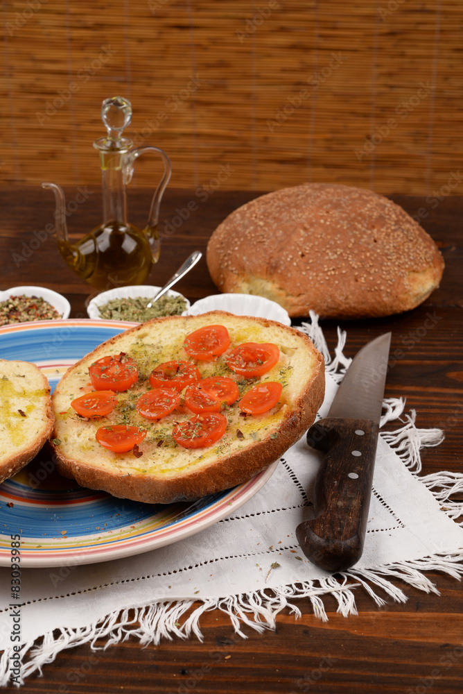 Bread baked in a wood seasoned - Pane cotto a legna condito Stock Photo ...