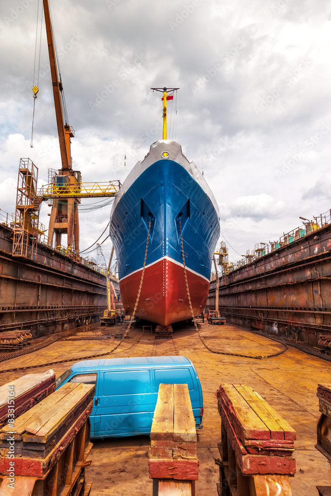 Big ship at dry dock with its bulbous parts and anchor chain. Stock ...