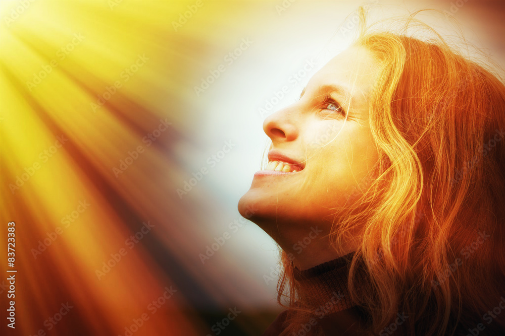 Junge Frau im Licht Stock-Foto | Adobe Stock