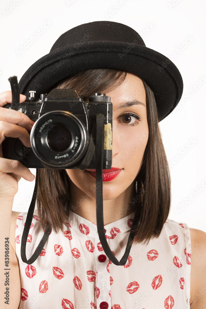 Pretty woman photographer with vintage camera taking picture Stock ...