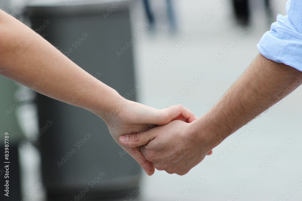 Hand in Hand Stock Photo | Adobe Stock