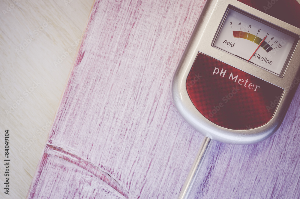 analog soil ph meter on a wood surface Stock Photo | Adobe Stock