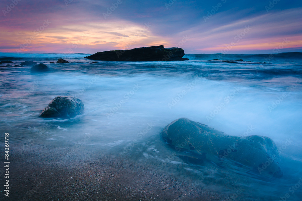 Waves and rocks in the Pacific Ocean at sunset, seen at Shell Be Stock ...
