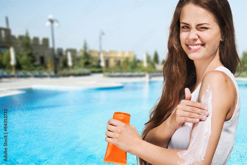 Lotion, sunblock, woman. Stock Photo | Adobe Stock