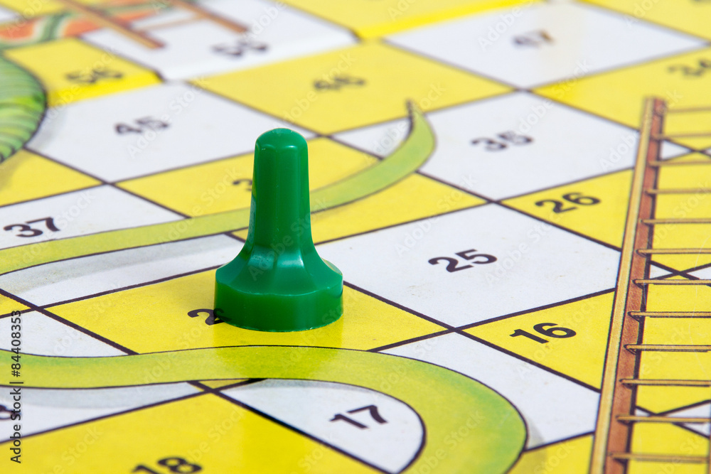 Snake and ladder board game closeup Stock Photo | Adobe Stock
