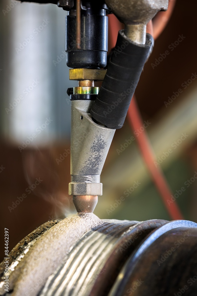 Hard surfacing by submerge arc welding process Stock Photo | Adobe Stock