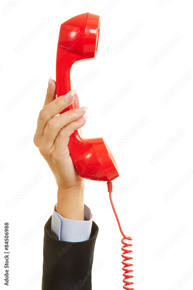 Hand hält rotes Telefon für Notruf Stock Photo | Adobe Stock