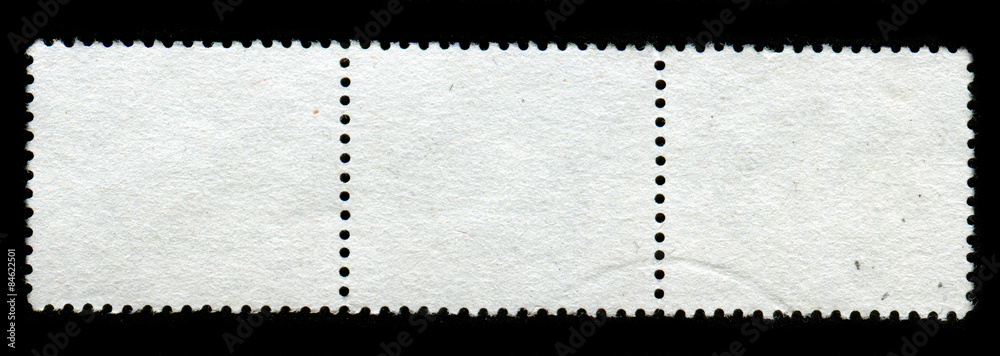 Reverse side of a postage stamp. Stock Photo | Adobe Stock
