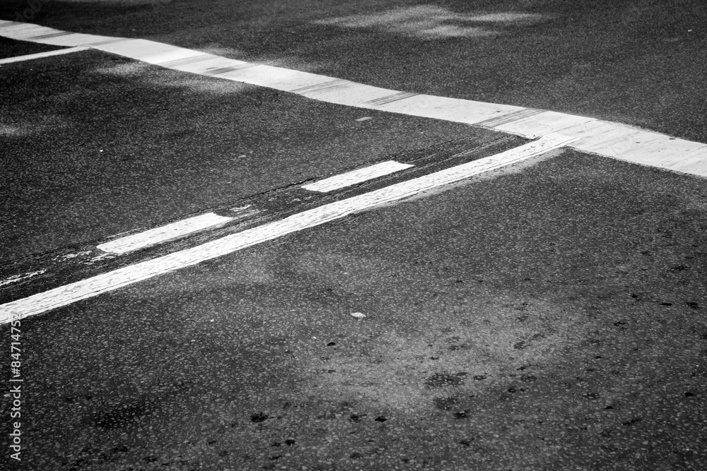 Asphalt road with stop line and tire tracks Stock Photo | Adobe Stock