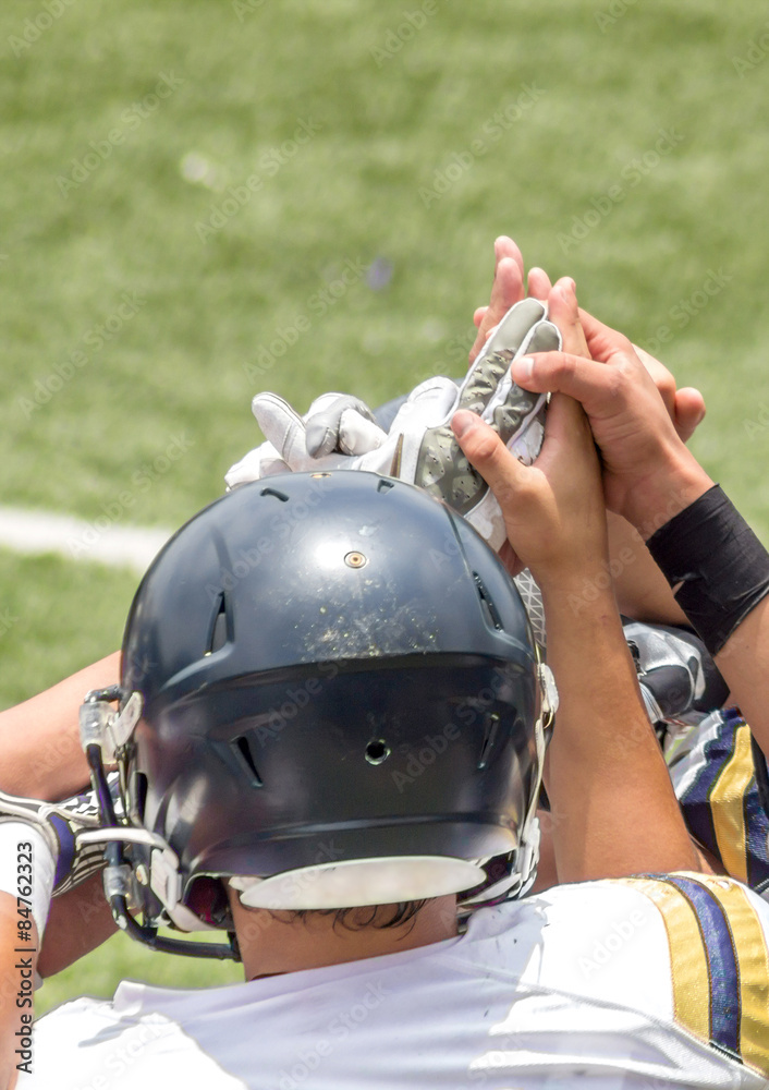 Kids playing football holding hands Stock Photo | Adobe Stock