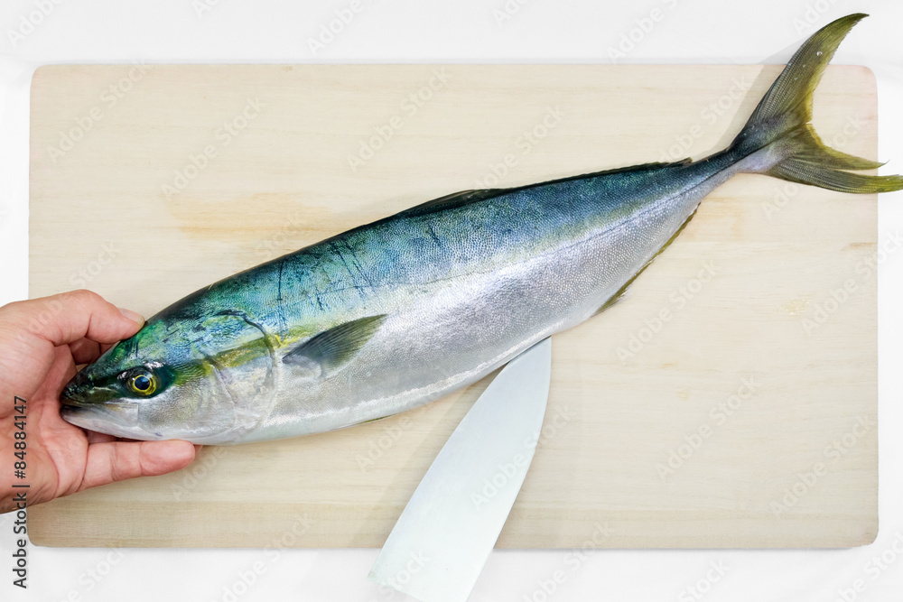 Fotografia do Stock: Preparing a Japanese yellowtail in the Japanese ...
