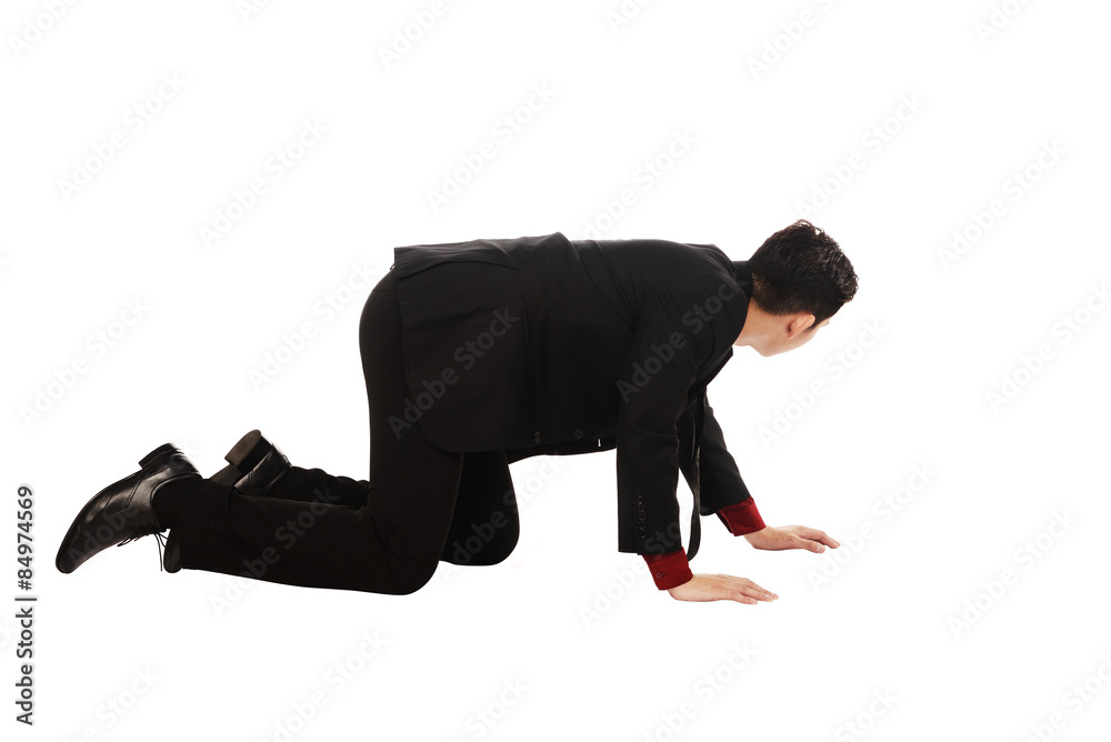 Asian Business Man Crouching Stock Photo | Adobe Stock