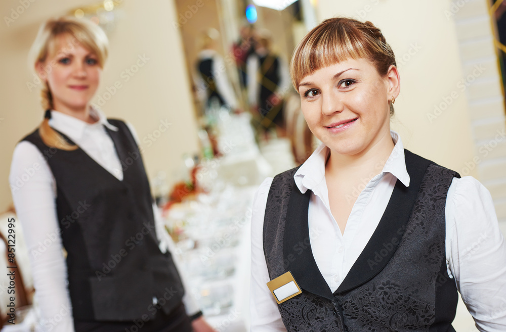 waitress at catering work in a restaurant Stock Photo | Adobe Stock