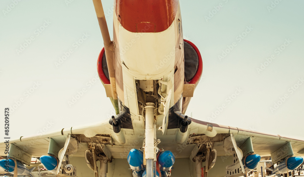 Bombs mounted under the wing of a fighter aircraft Stock Photo | Adobe ...