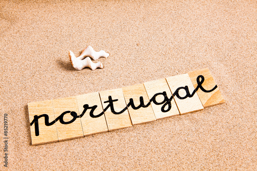 Words formed from small pieces of wood containing a sun and beach ...