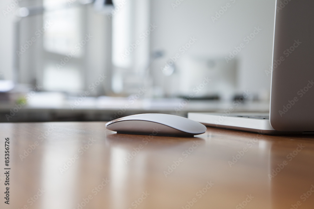 Mouse on wooden desk Stock-Foto | Adobe Stock