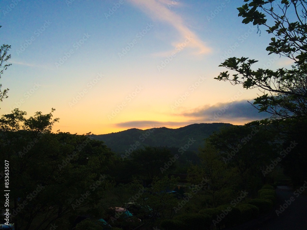 Sunrise over the low hill Stock Photo | Adobe Stock