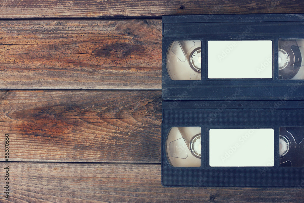 stack of VHS video tape cassette over wooden background Stock Photo ...