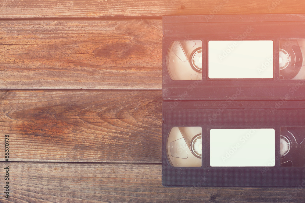 stack of VHS video tape cassette over wooden background Stock Photo ...