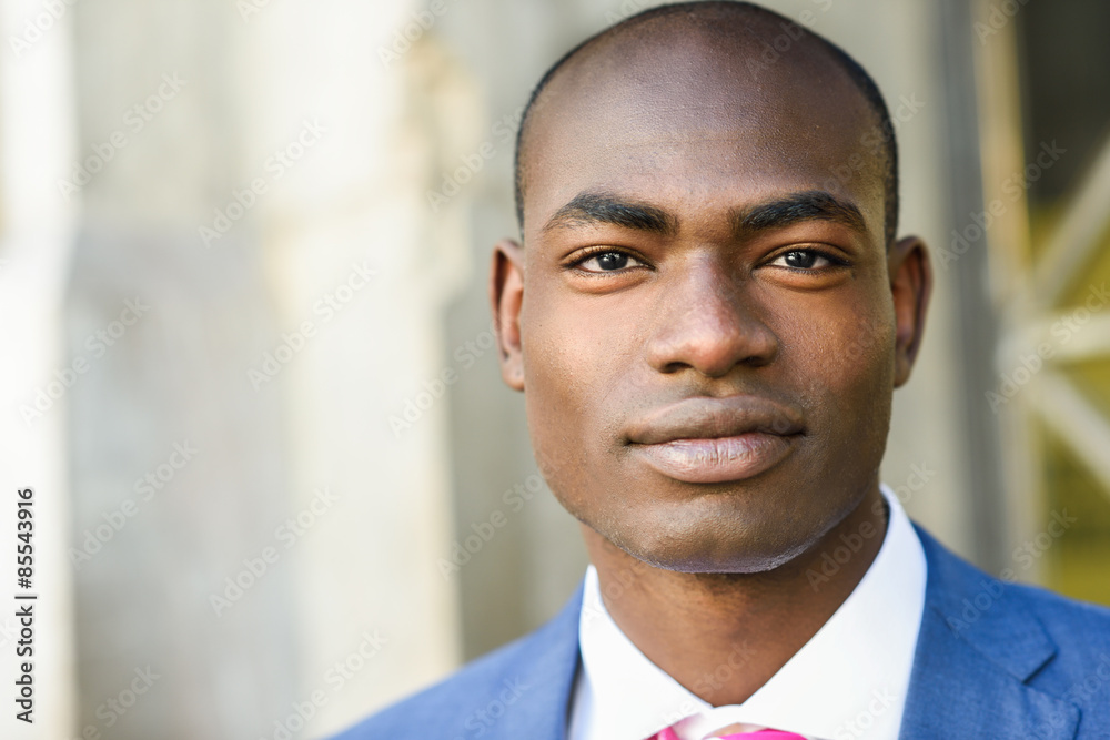 Handsome black man wearing suit in urban background Stock Photo | Adobe ...
