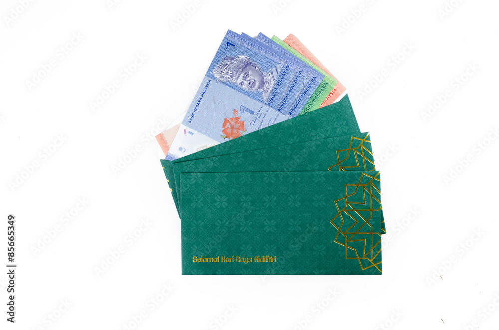 'Duit Raya' is money given from adult to children during Eid al-Fitr ...