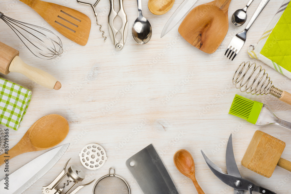 Kitchen utensils and cutlery background with copy space in center Stock ...