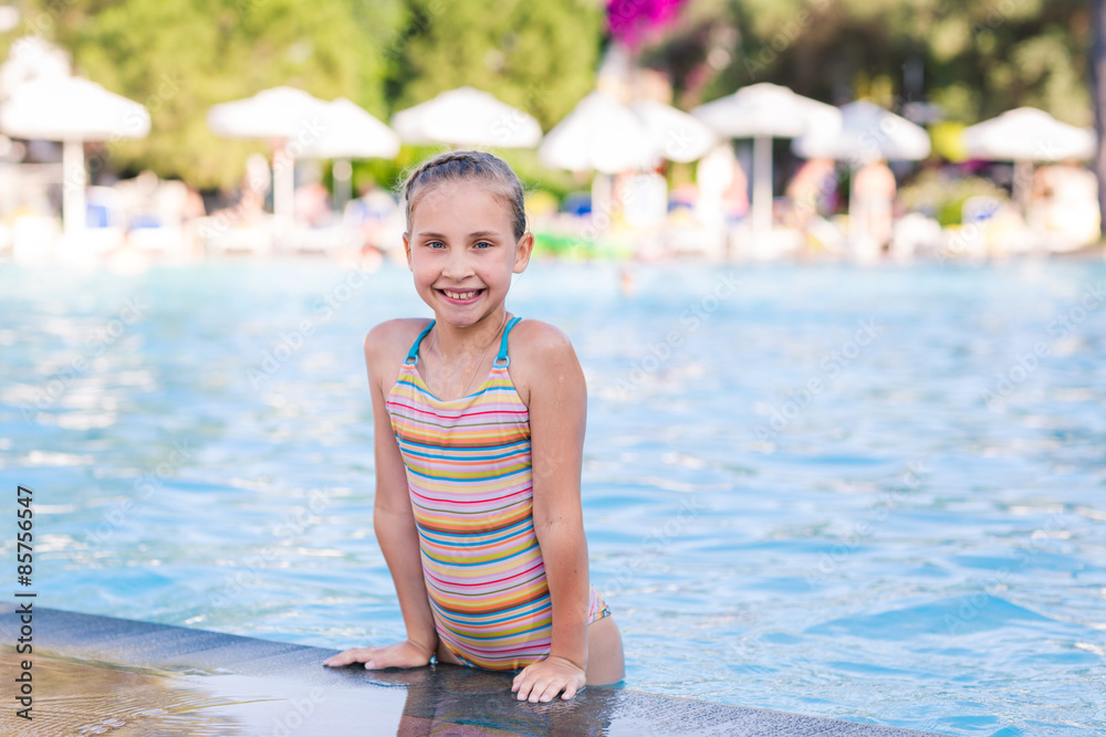 Cute little girl in swimming pool Stock Photo | Adobe Stock