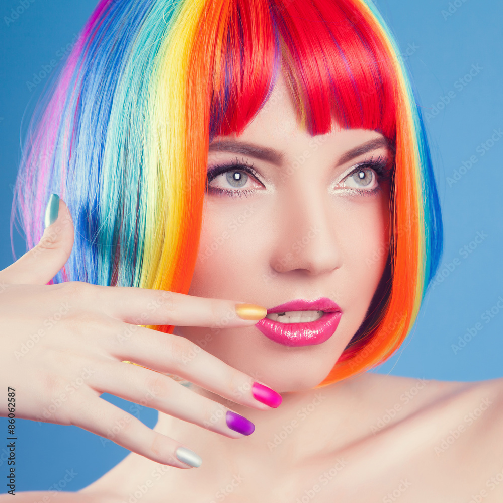 beautiful woman wearing colorful wig Stock Photo | Adobe Stock
