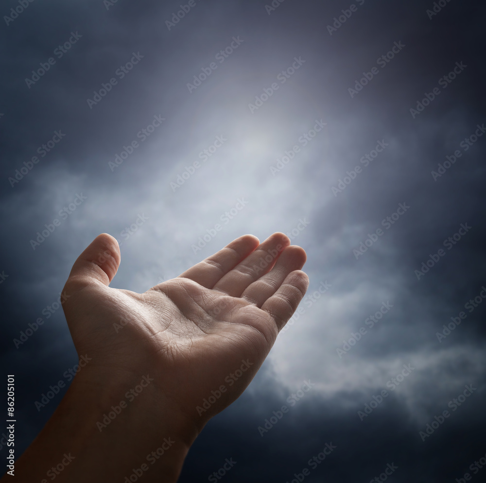 Hand Reaching Up To Sky