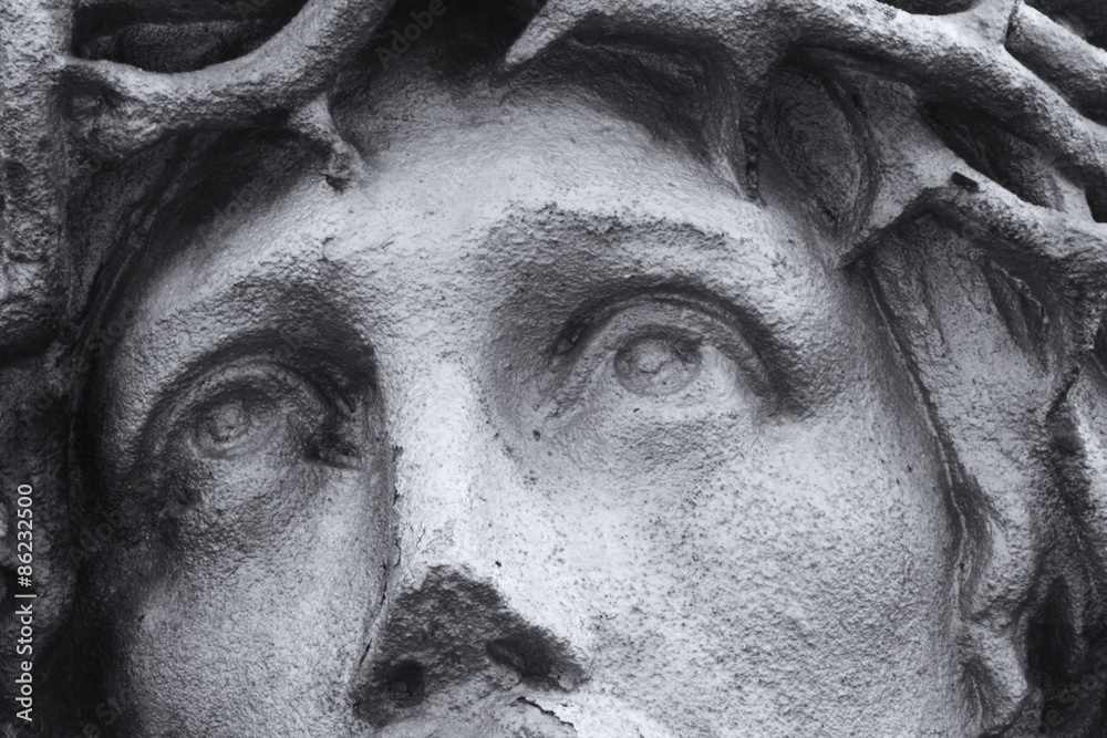 crucified Jesus Christ, eyes (statue fragment) Stock Photo | Adobe Stock