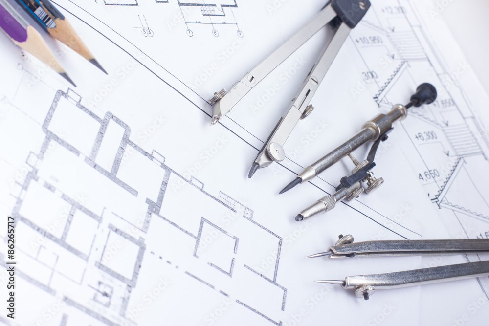 Architectural project, blueprints, blueprint rolls and divider compass ...