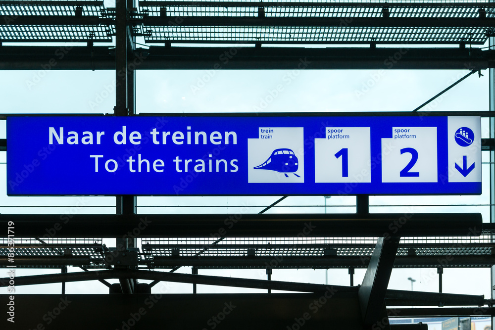 Directional sign to trains in Schiphol International Airport, Amsterdam ...