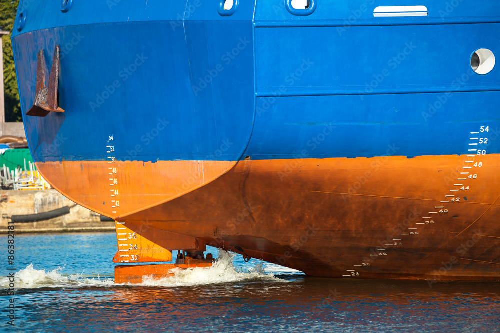 Stern of ship with working screw and rudder. Stock Photo | Adobe Stock