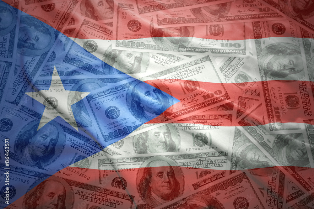 colorful waving puerto rican flag on a american dollar money background ...