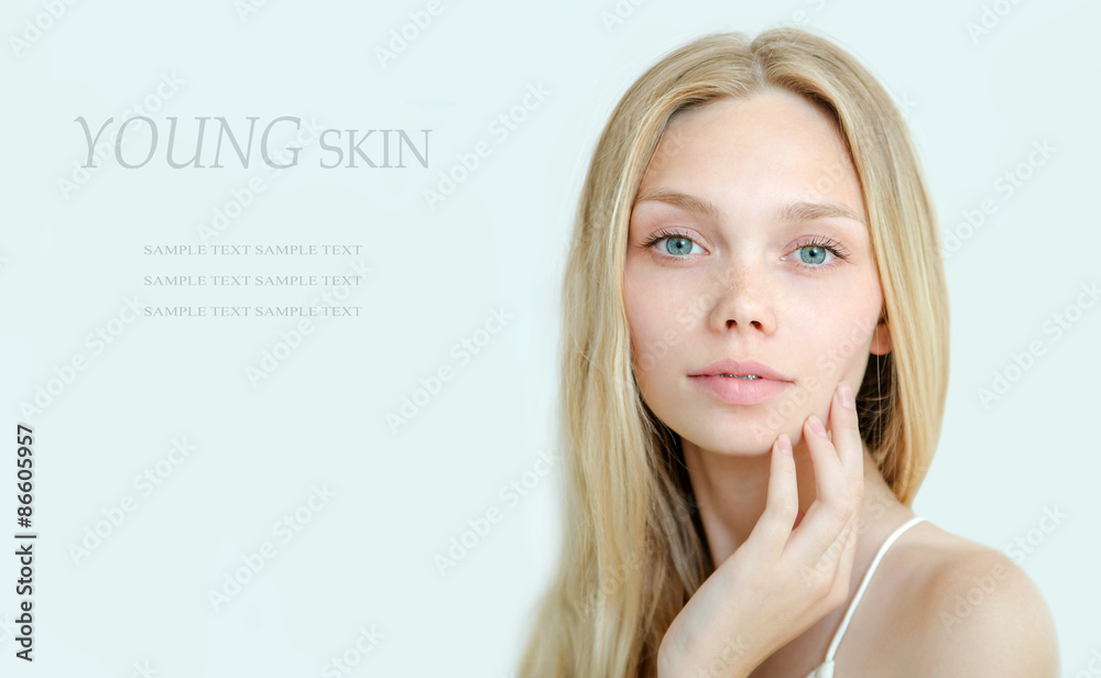 Beautiful young woman with clean fresh skin Stock Photo | Adobe Stock