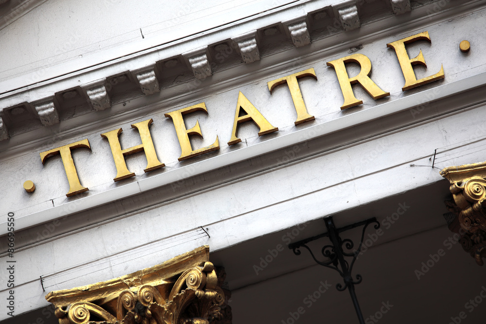 Theatre sign above entrance to an old theater building in London West ...